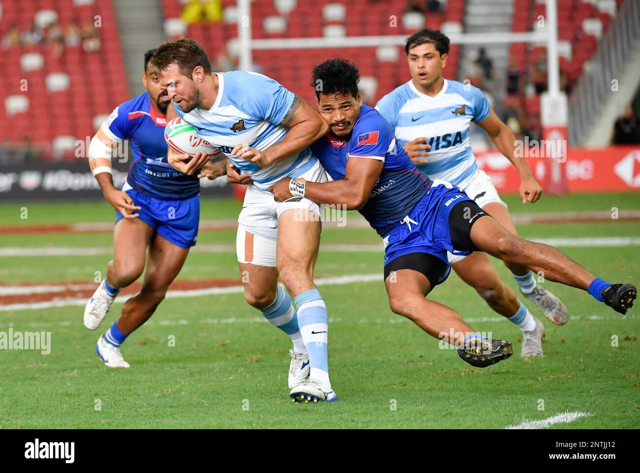 Samoa's Johnny Samuelu tackles Argentina's Fernando Luna during the ...