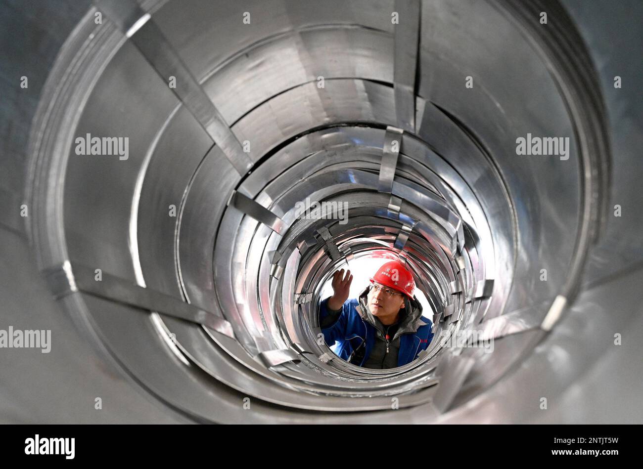 HANDAN, CHINA - FEBRUARY 28, 2023 - Workers at an equipment ...