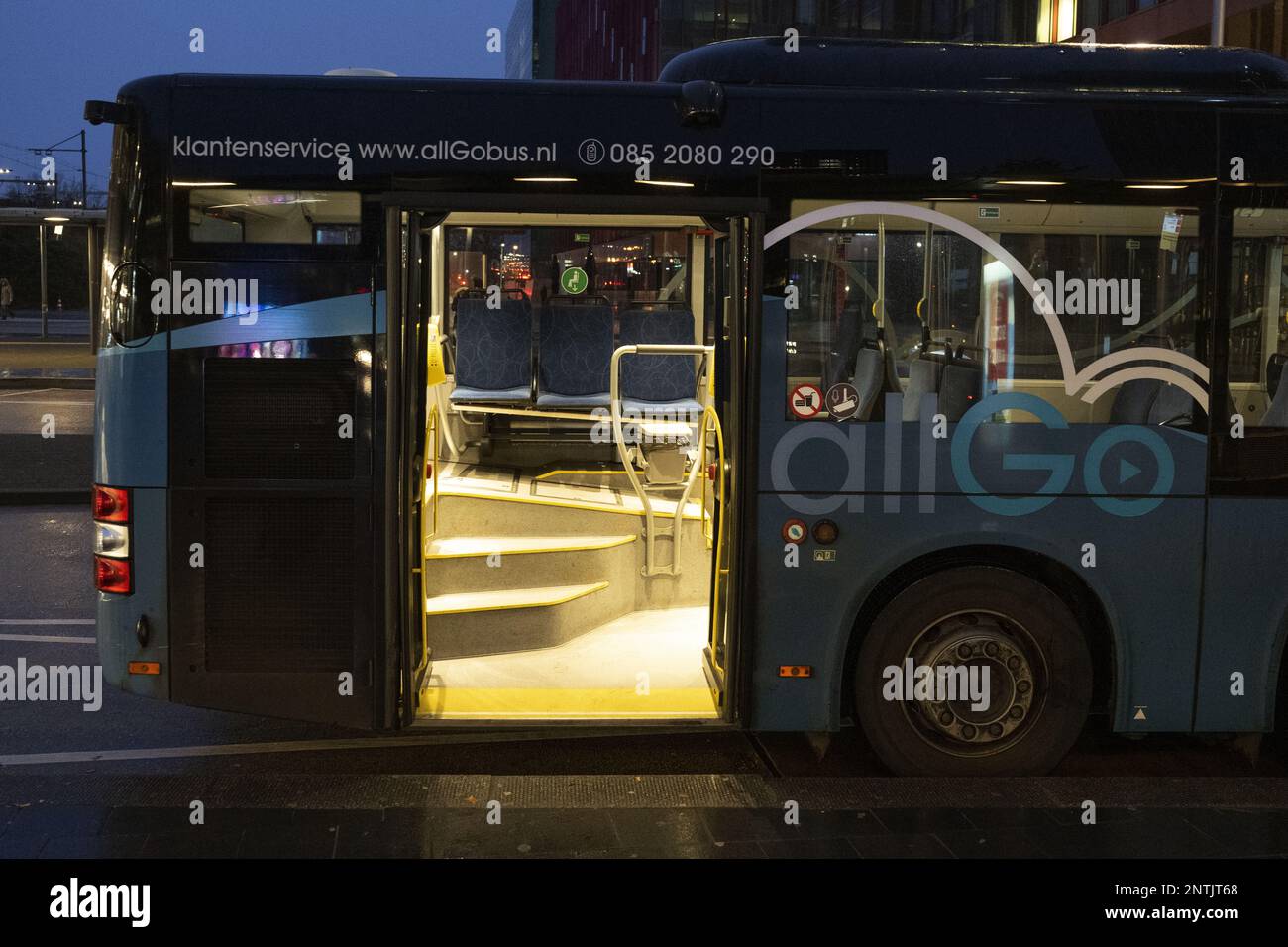 ALMERE - A bus at Central Station. Regional transport staff are on ...