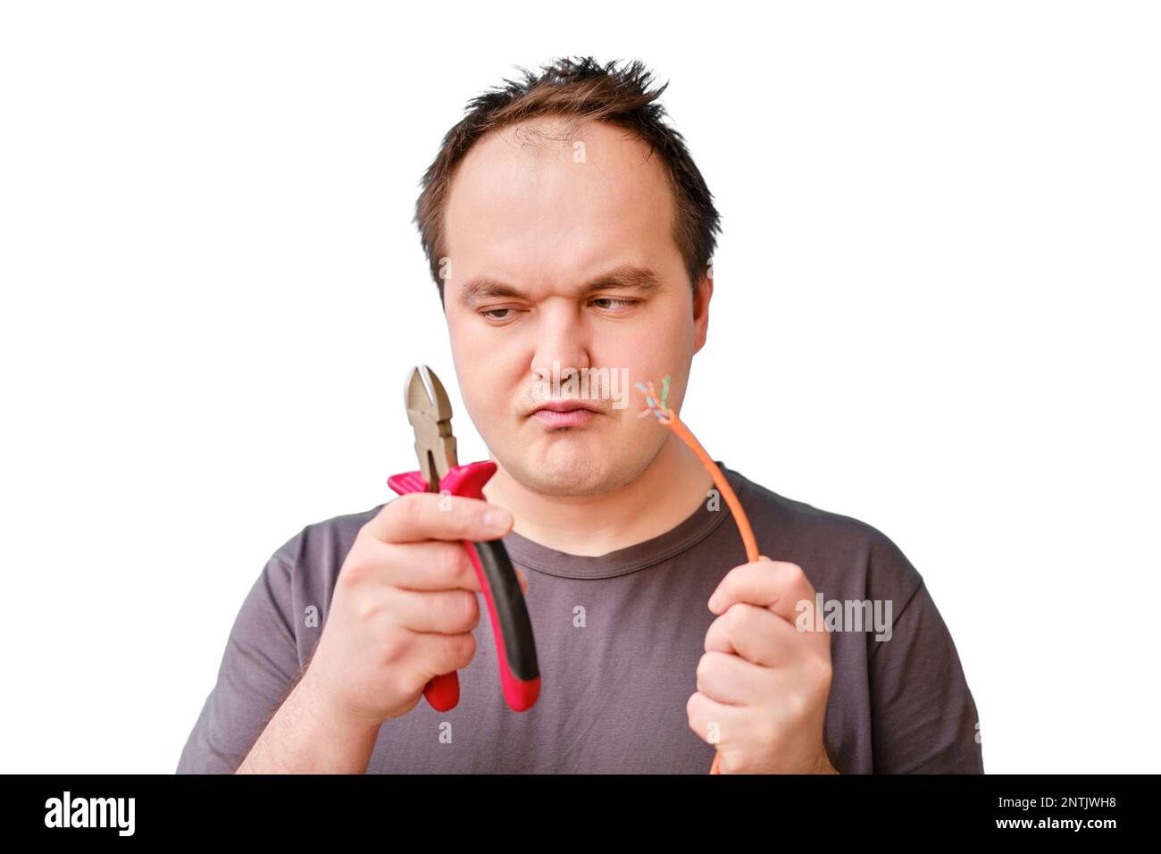 Portrait of disheveled adult male with wire cutters and cut off ...