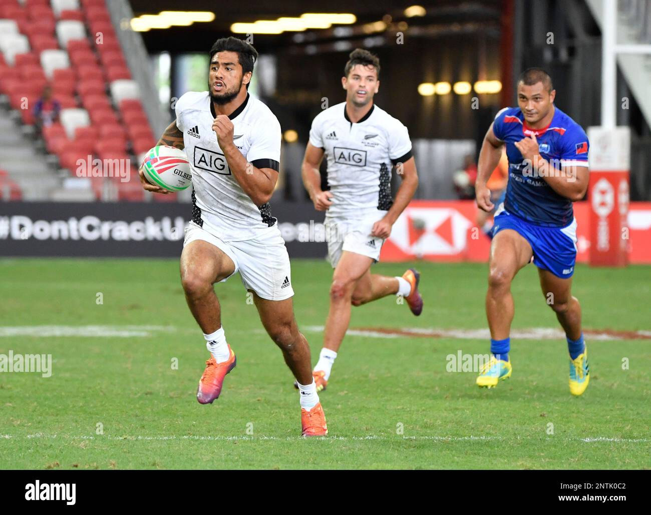 New Zealand's Regan Ware makes a break during the HSBC Singapore Rugby ...