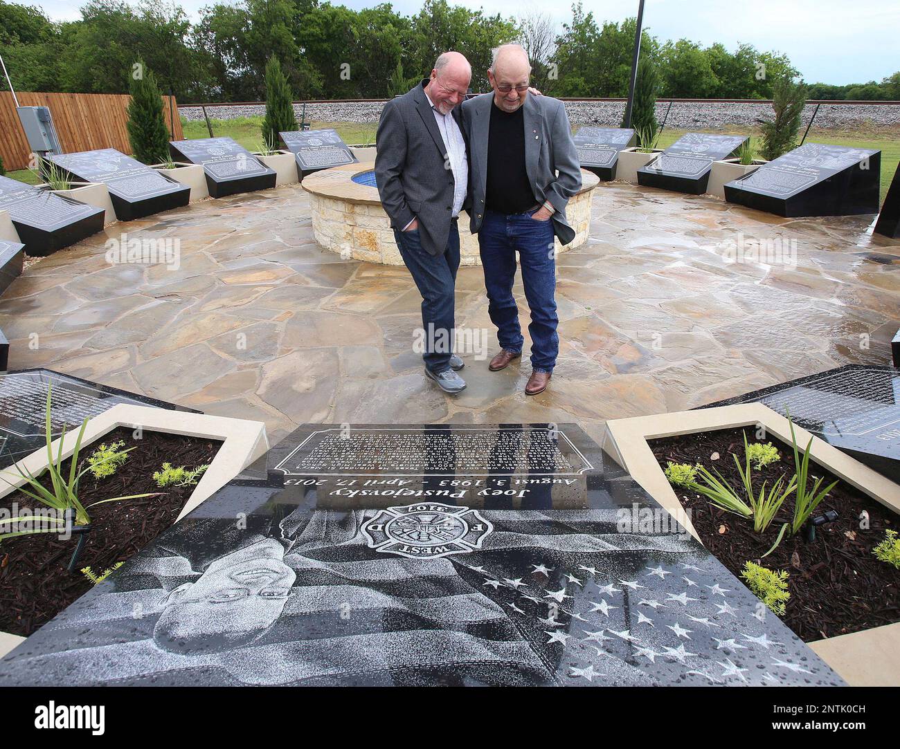West Mayor Tommy Muska, left, and Joe Pustejovsky reflect as they look ...