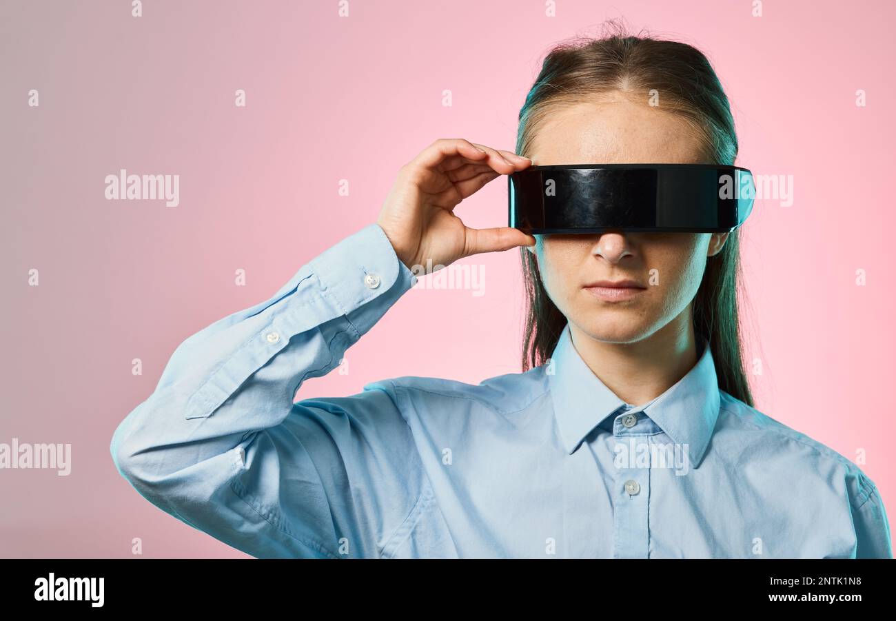 Virtual reality glasses, metaverse and futuristic tech with young woman ...
