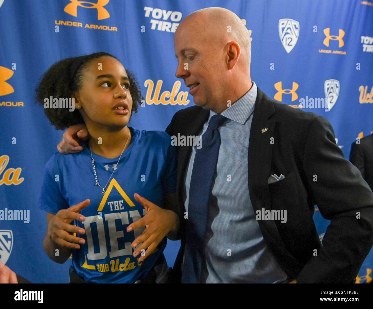 Mick Cronin (right) embraces daughter Samantha Cronin after being ...