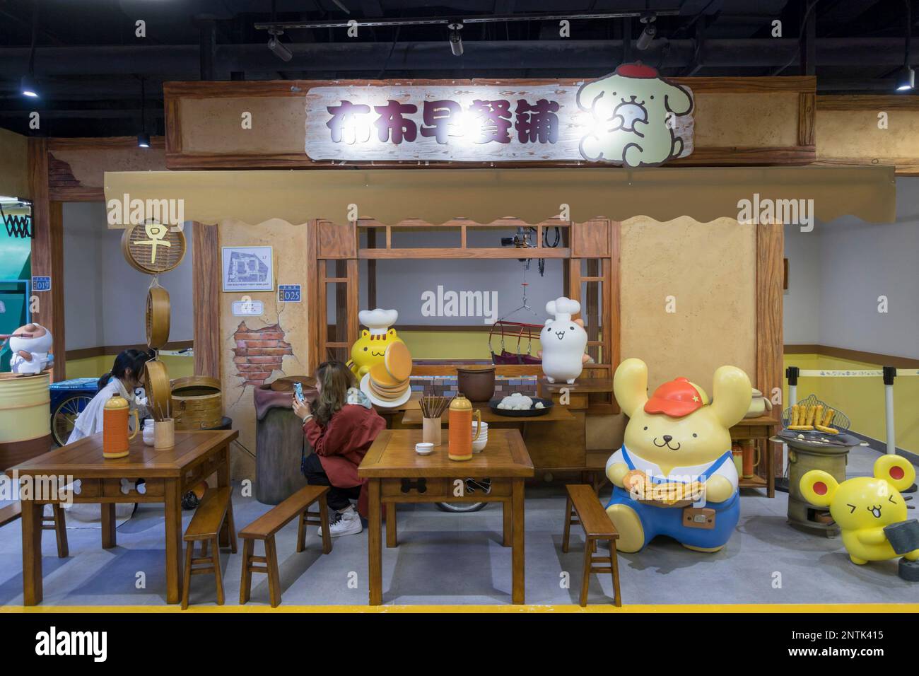 People tour in the 6,000-square-meter Hello Kitty Shanghai Time theme ...