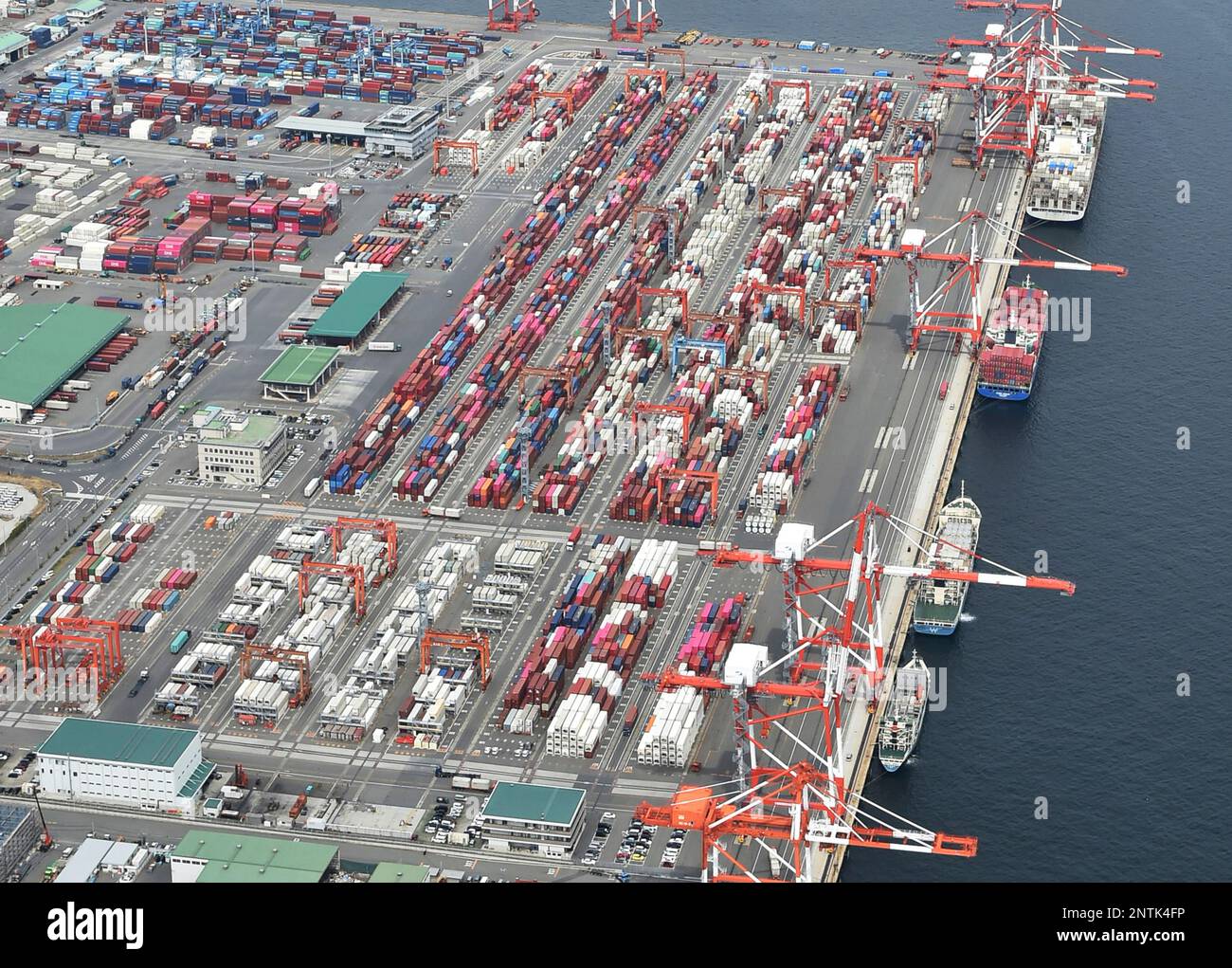 An aerial photo shows Container terminal at Port Island at Port of Kobe ...