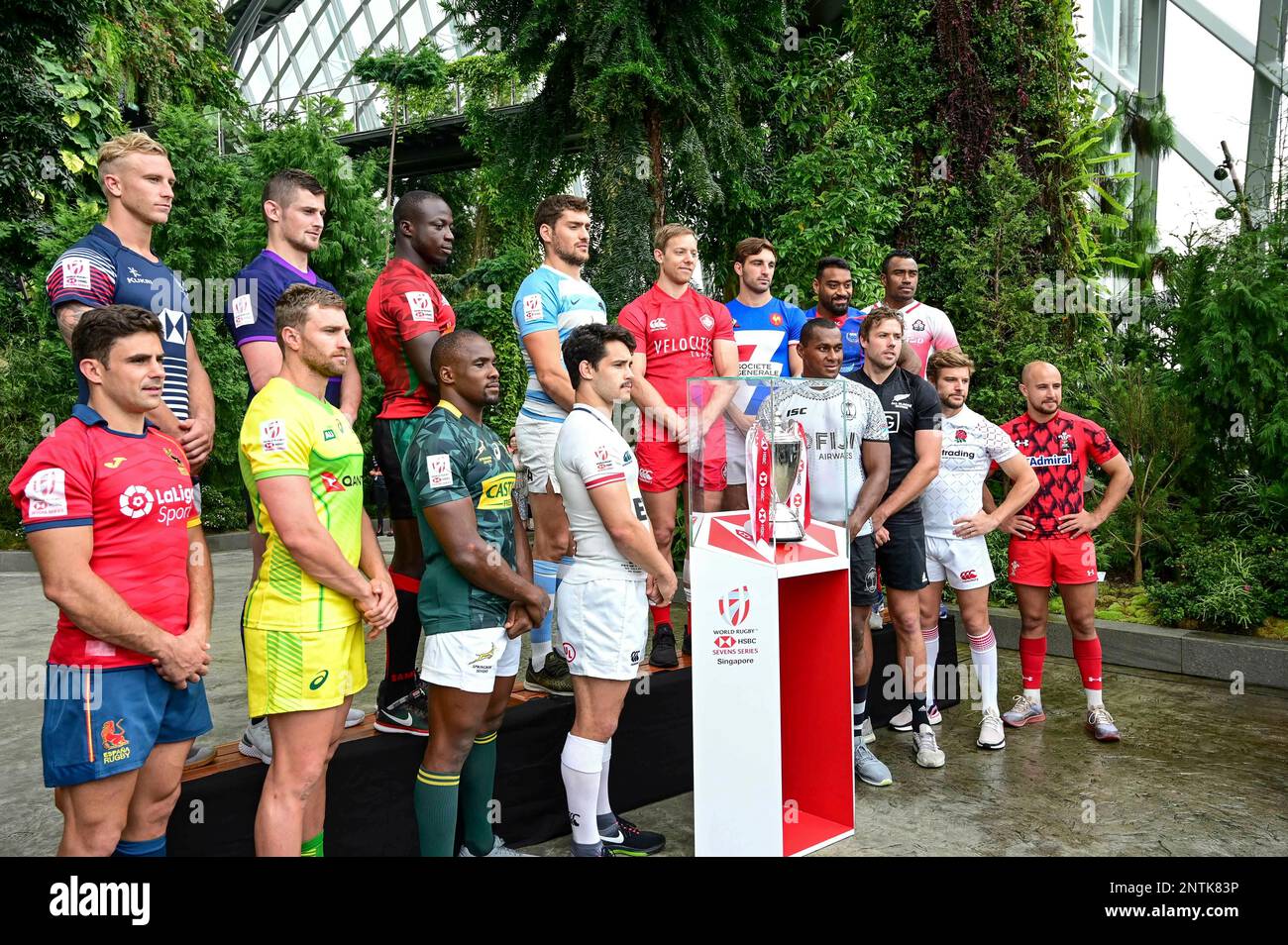 The team captains pose with the trophy during the HSBC Singapore Rugby ...