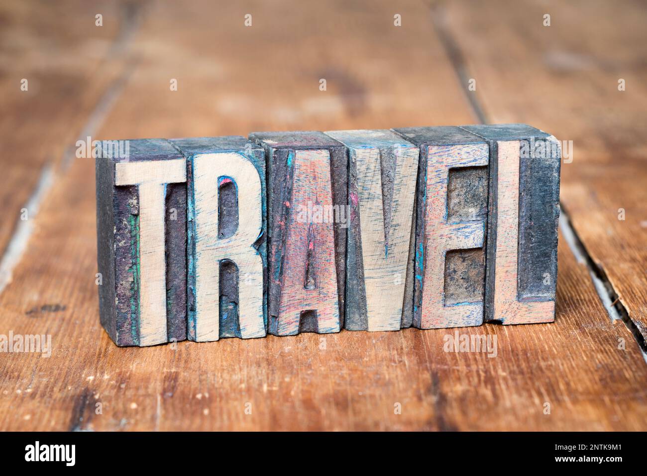 travel word made from wooden letterpress type on grunge wood Stock ...