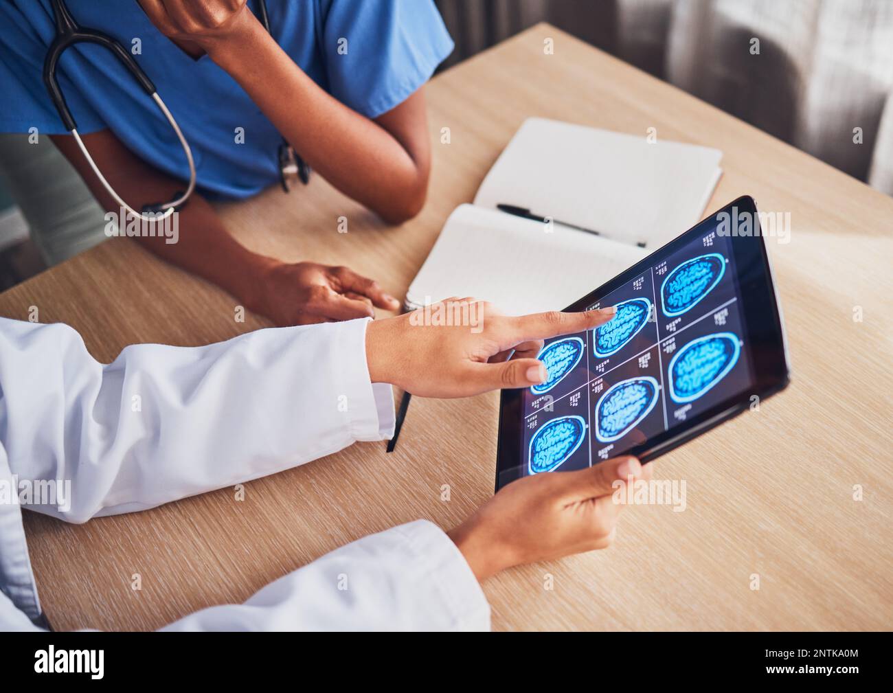 Doctor, tablet and brain xray, neurology and digital test results ...