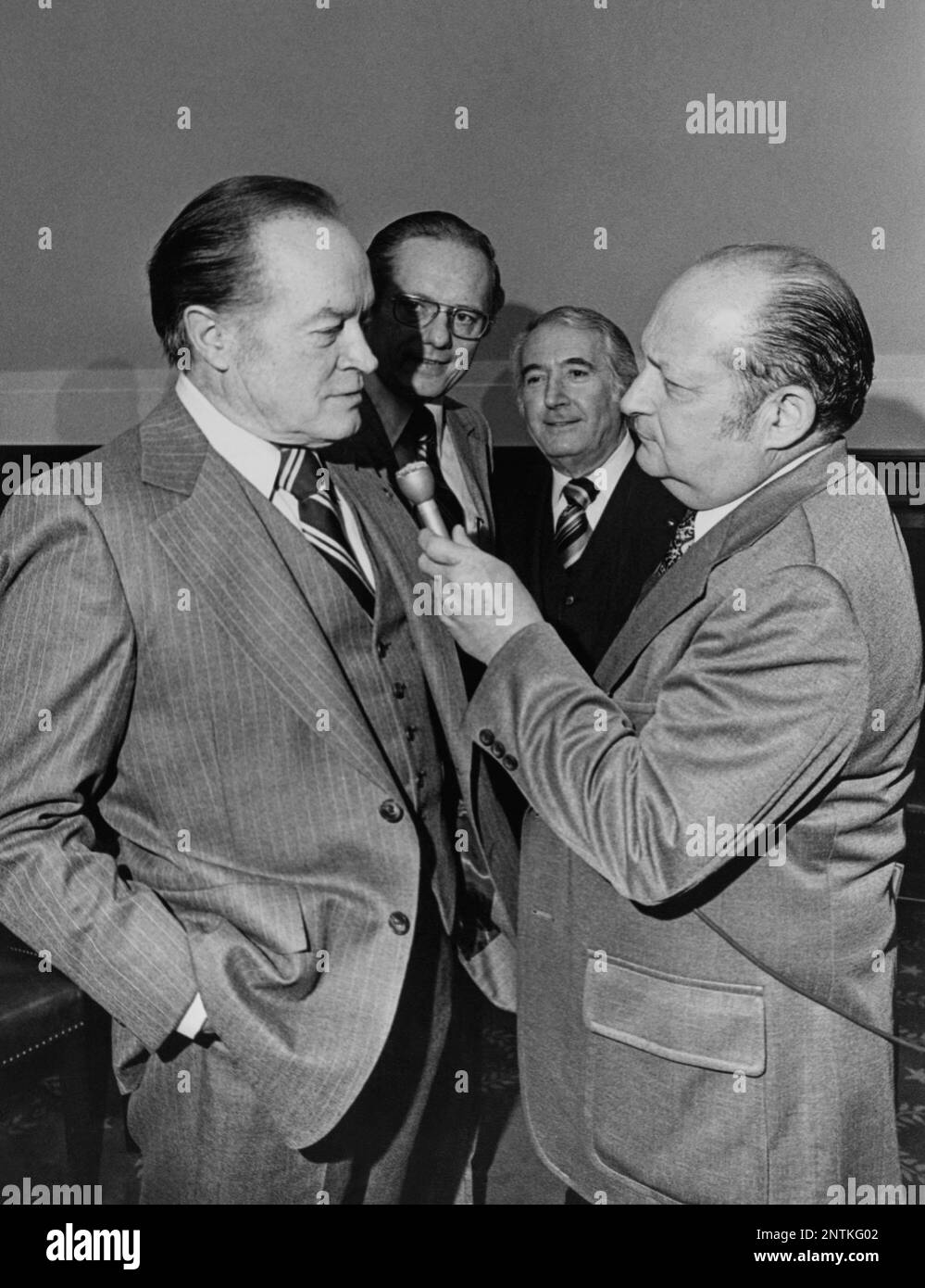 Actor Bob Hope, interviewed by House Press Gallery. Behind are Rep ...