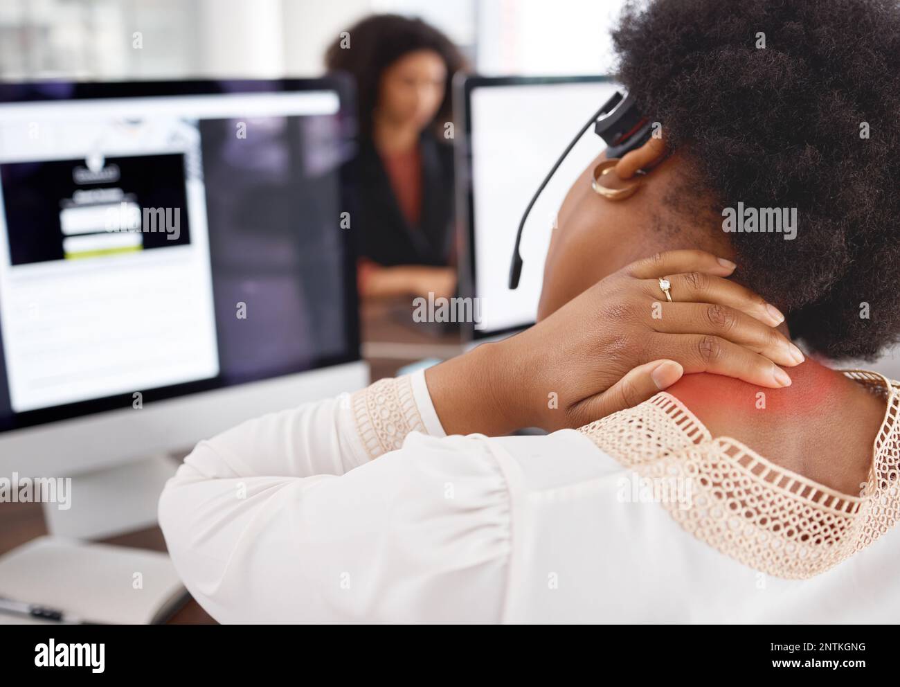 Hand, neck pain and call center with a black woman consultant working ...
