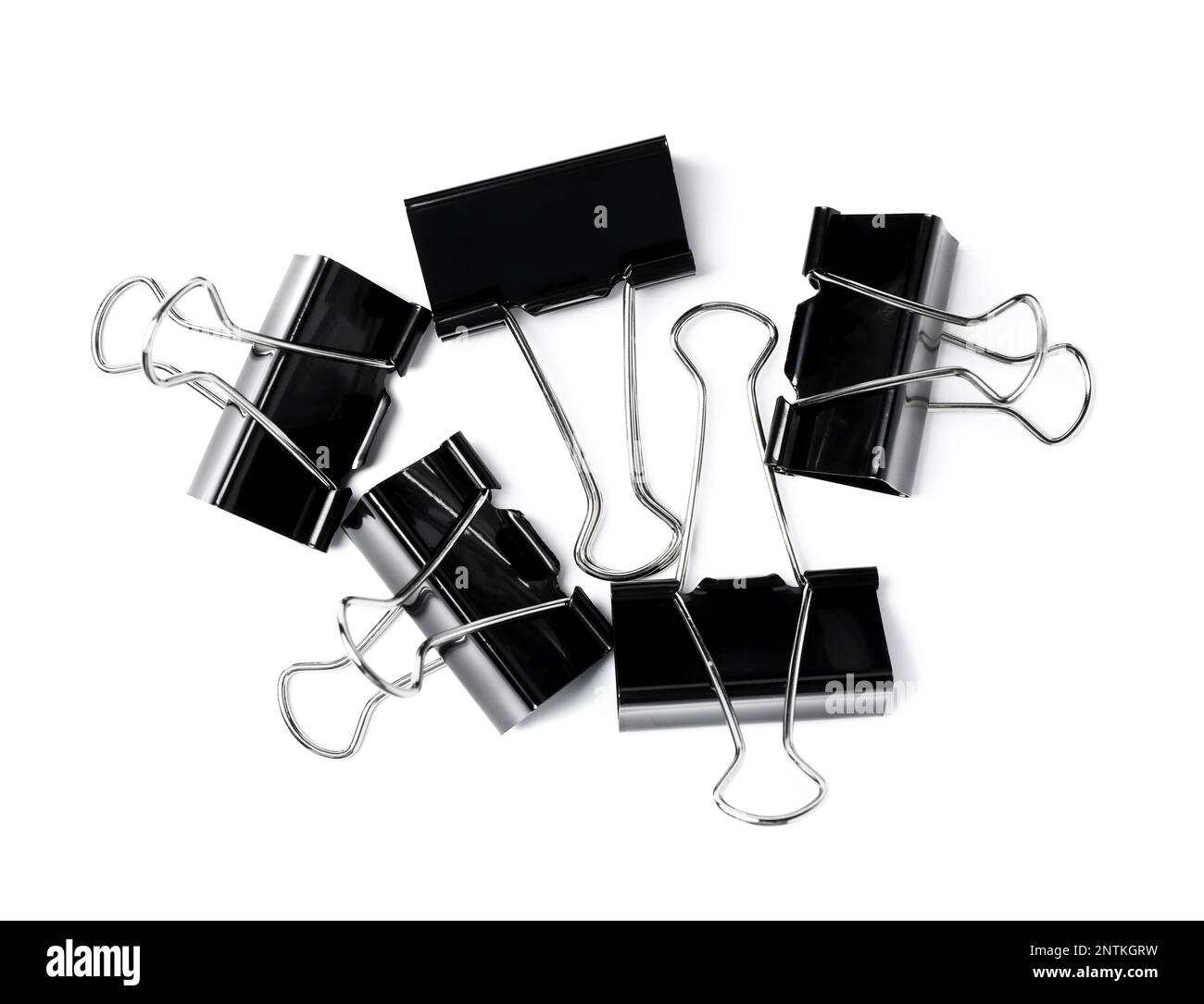 Black binder clips on white background, top view Stock Photo - Alamy