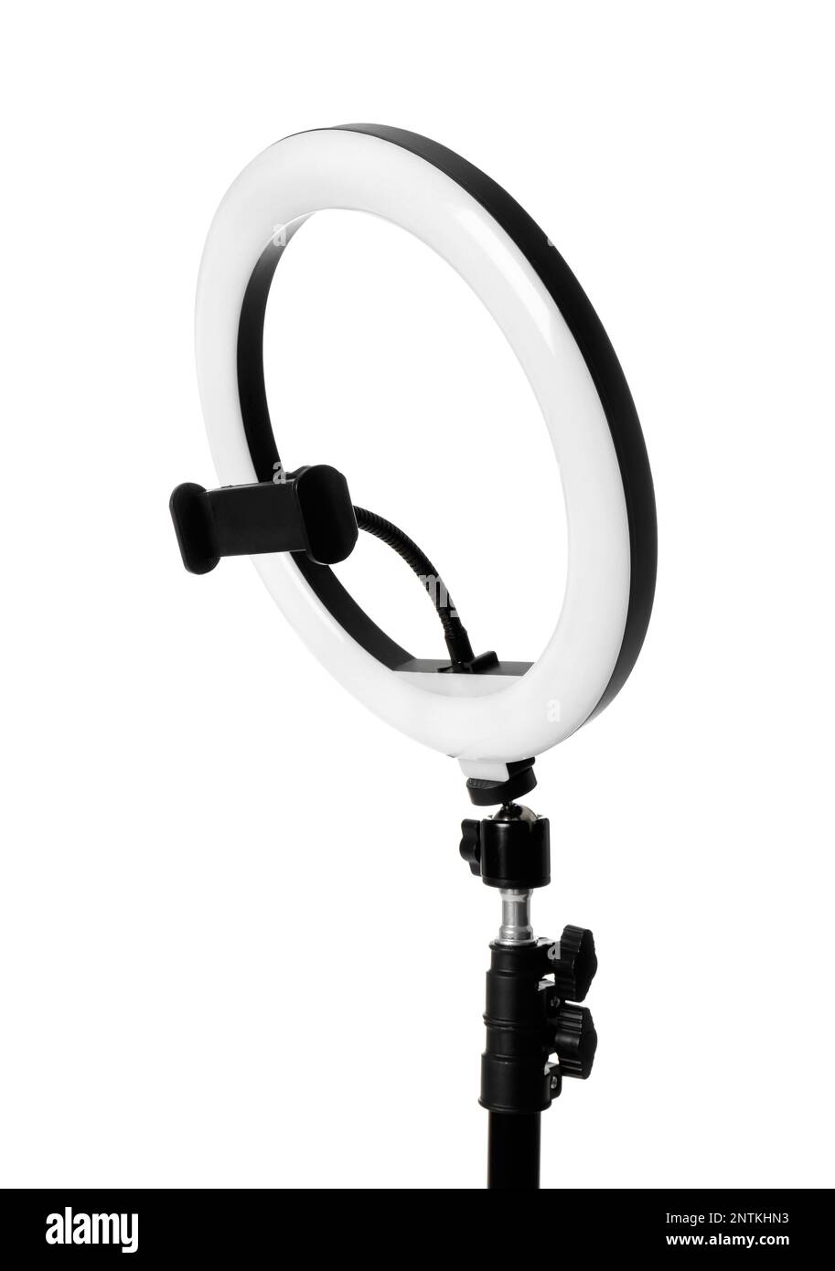 Modern ring light on stand against white background Stock Photo - Alamy