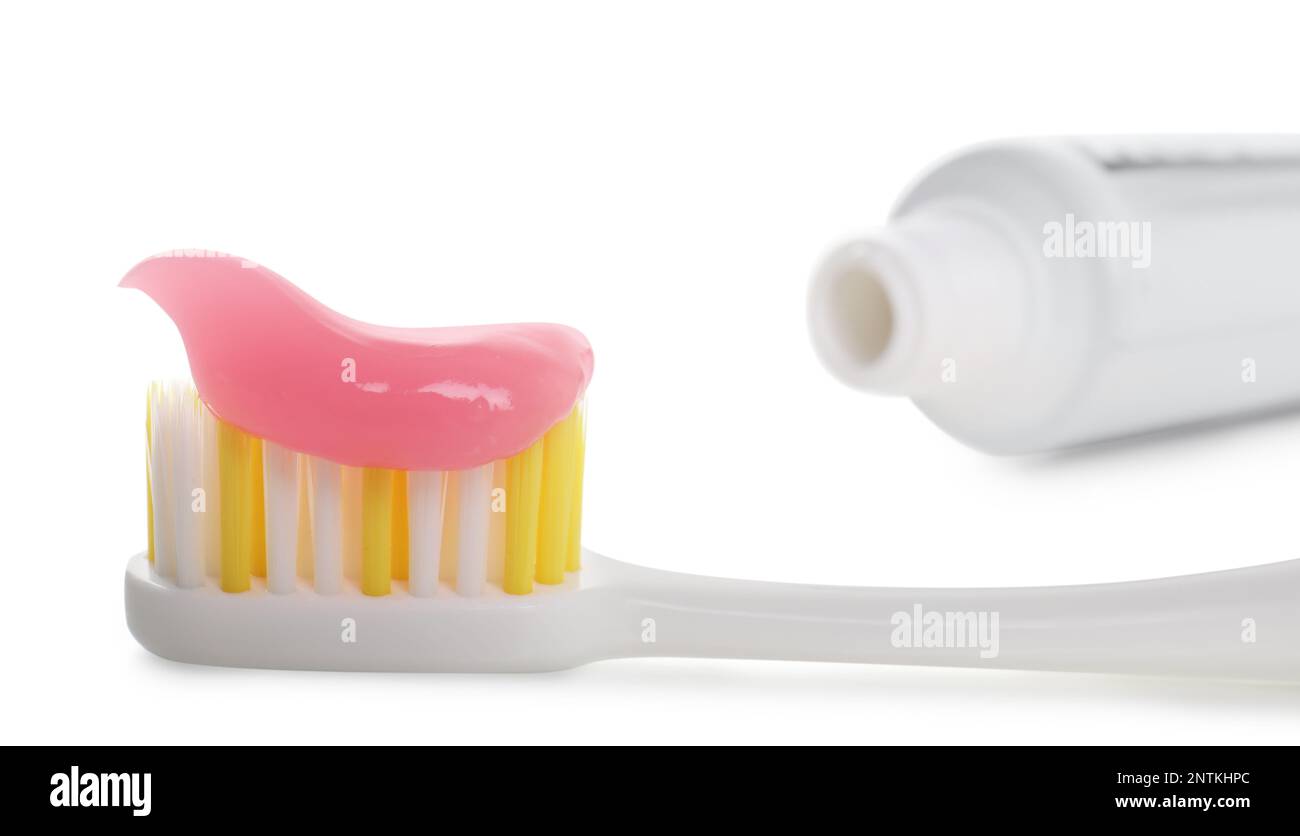 Brush with toothpaste and tube on white background, closeup Stock Photo ...