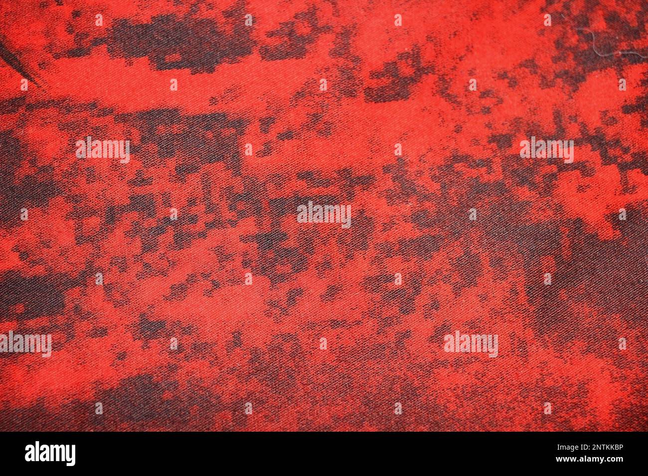 red fabric texture with an unusual pattern Stock Photo - Alamy