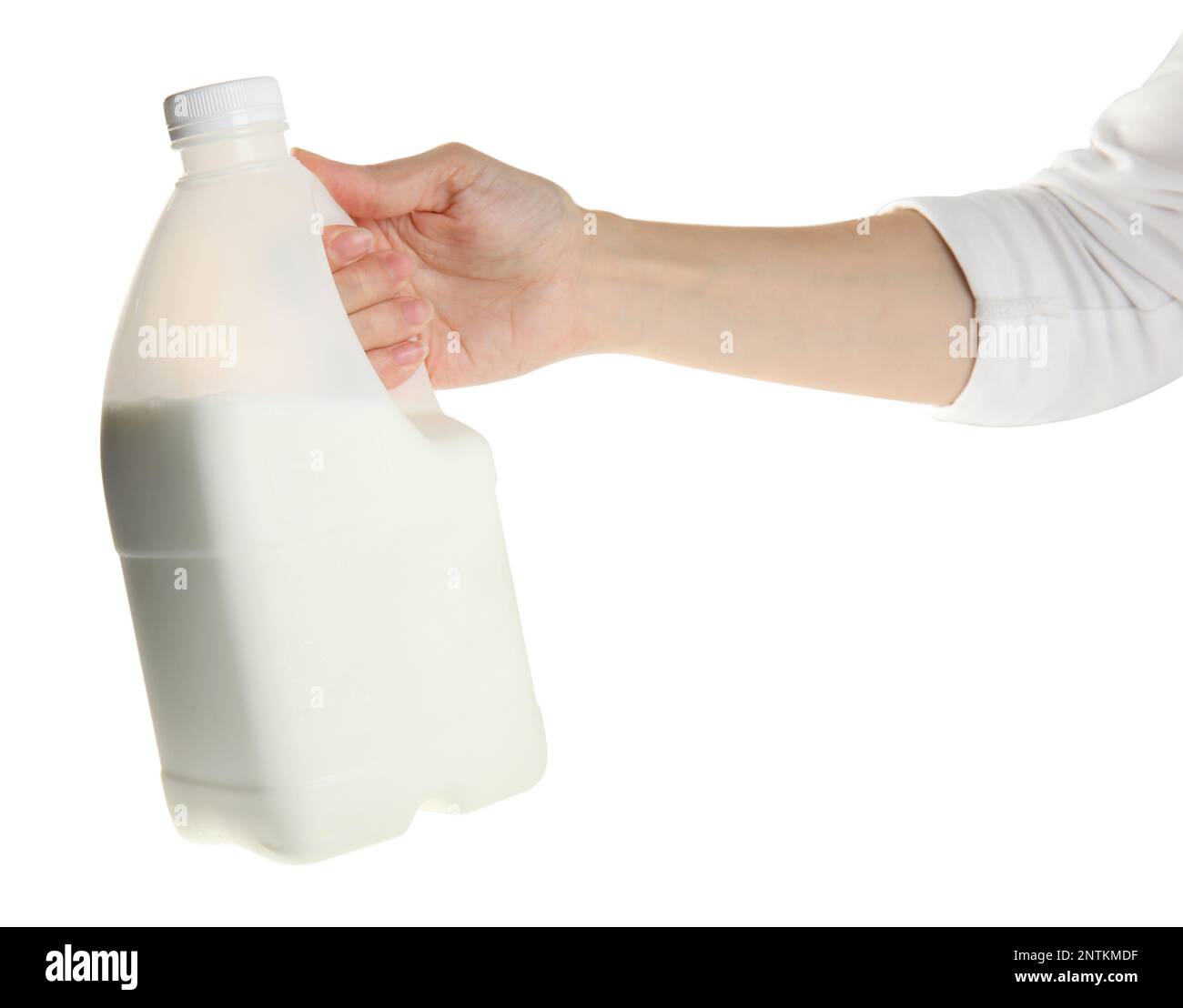 Woman holding gallon bottle of milk on white background, closeup Stock ...