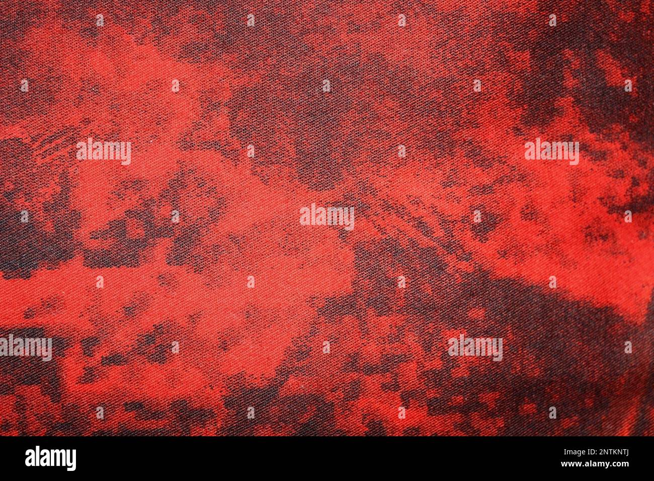 red fabric texture with an unusual pattern Stock Photo - Alamy