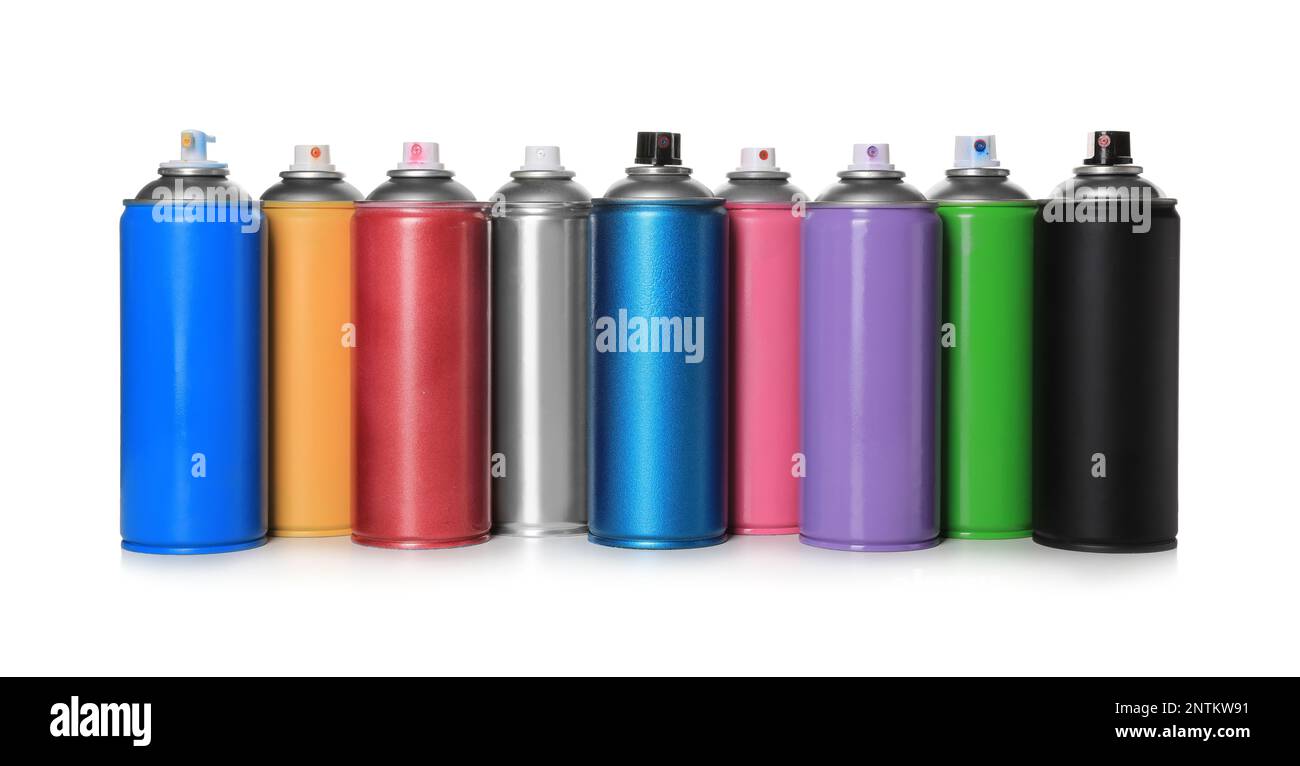 Cans of different spray paints on white background. Graffiti supplies ...
