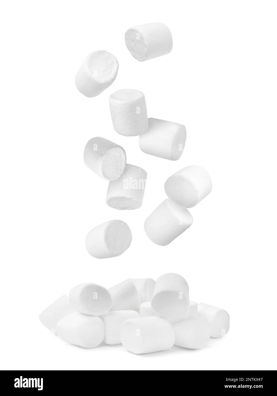 Delicious sweet puffy marshmallows flying on white background Stock ...