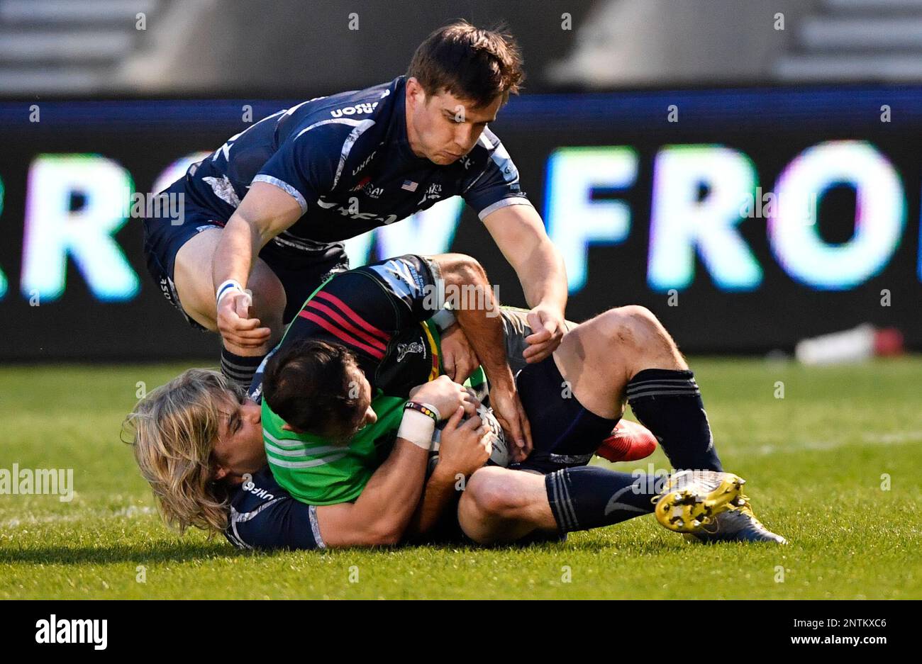 Sale Sharks scrum-half Faf De Klerk tackles Harlequins scrum-half Danny ...