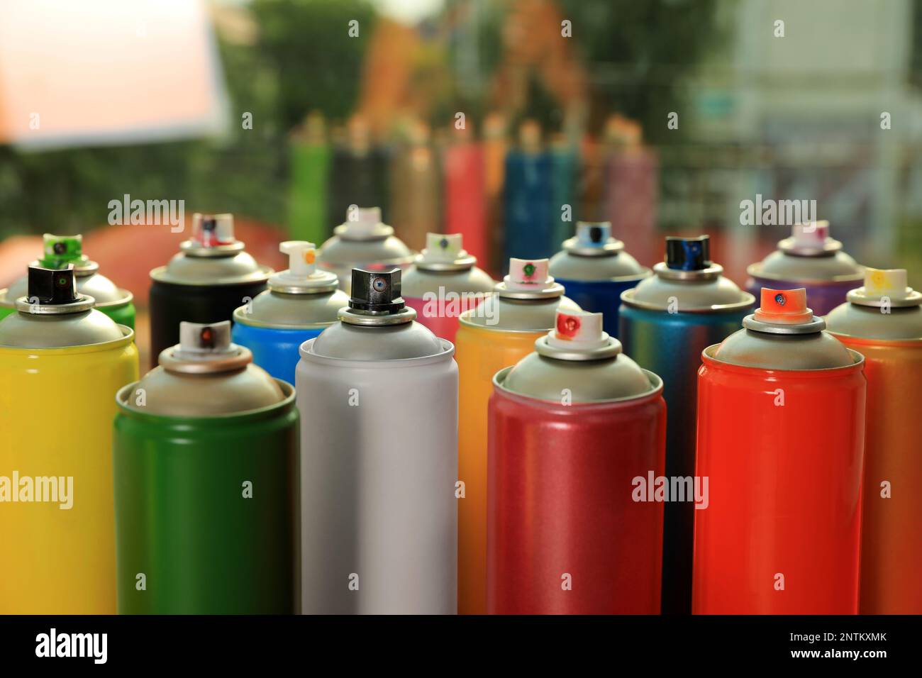 Many cans of different graffiti spray paints near window Stock Photo ...