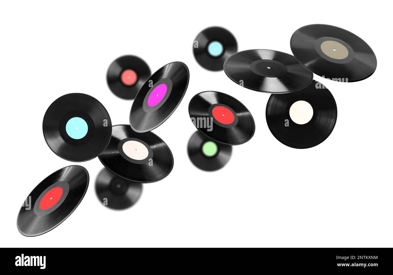 Black vintage vinyl records flying on white background Stock Photo - Alamy