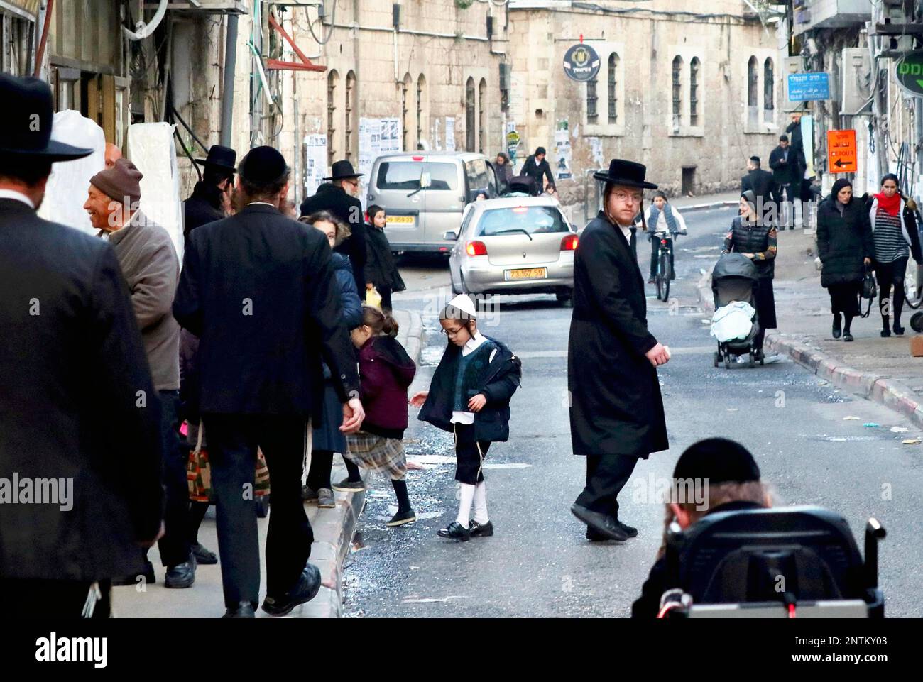 Haredi Judaism, ultra-Orthodox Judaism, men wearing a black suit and a ...