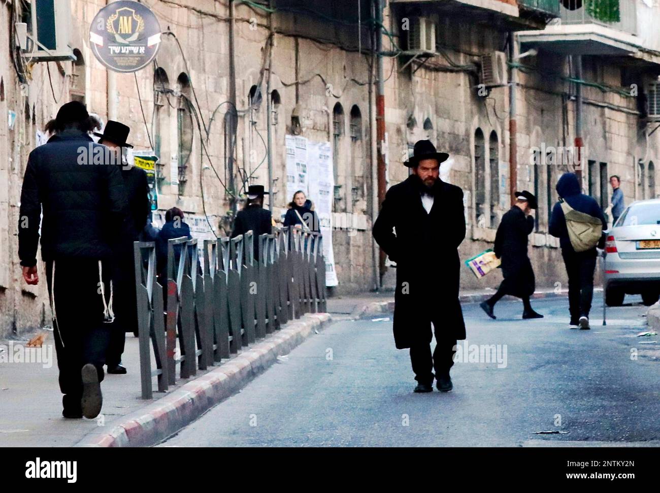 Haredi Judaism, ultra-Orthodox Judaism, men wearing a black suit and a ...