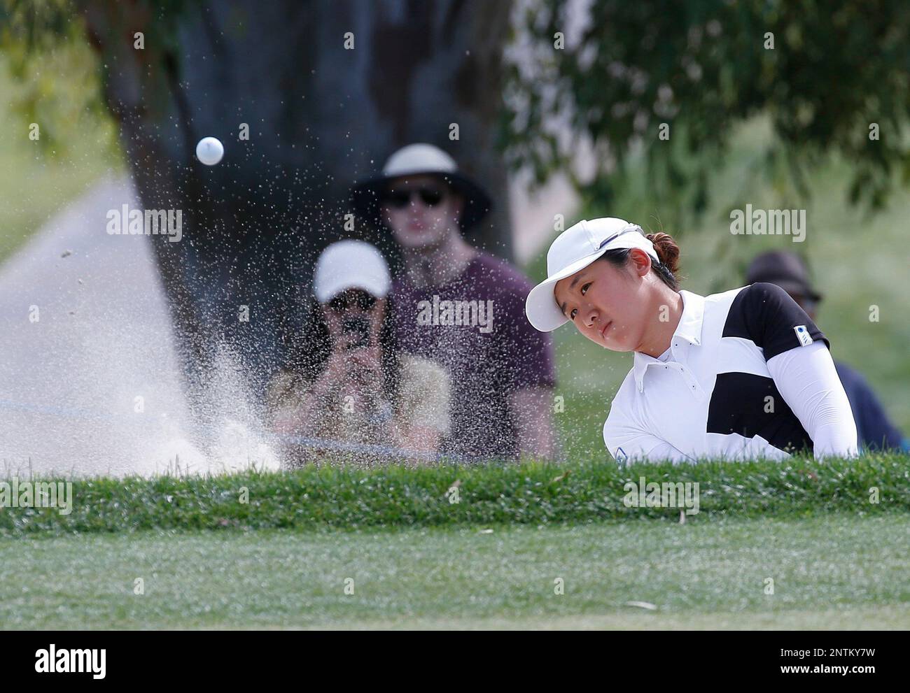 April 06, 2019 Jing Yan of China hits out of a bunker on the eighth ...