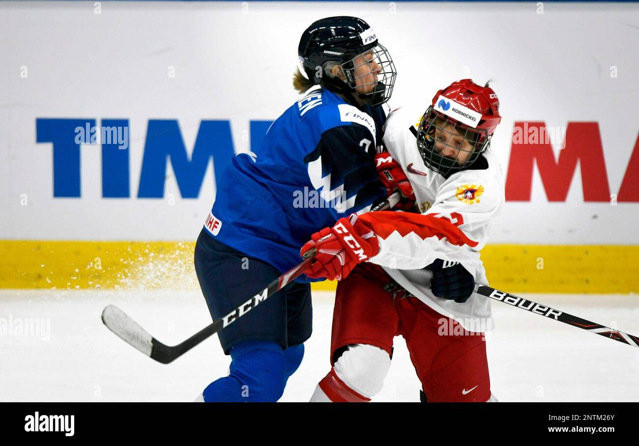 Isa Rahunen of Finland, left, and Oxana Bratisheva of Russia during the 2019 IIHF Women's Ice ...