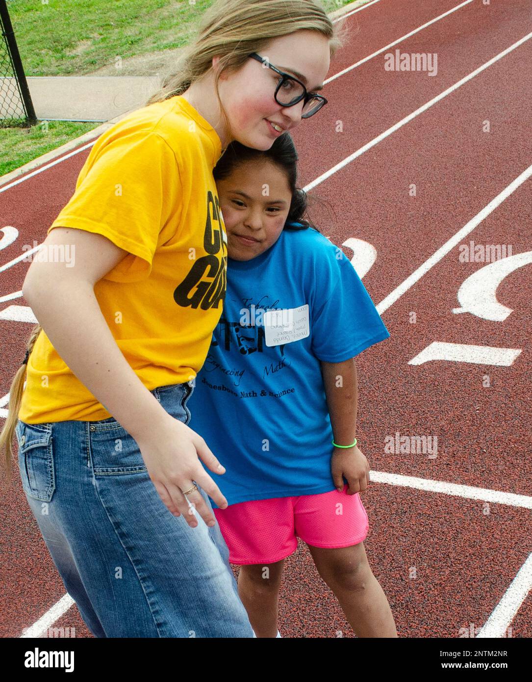 Special Olympics volunteer Kaylee Hoffman, left, a student from Sloan ...