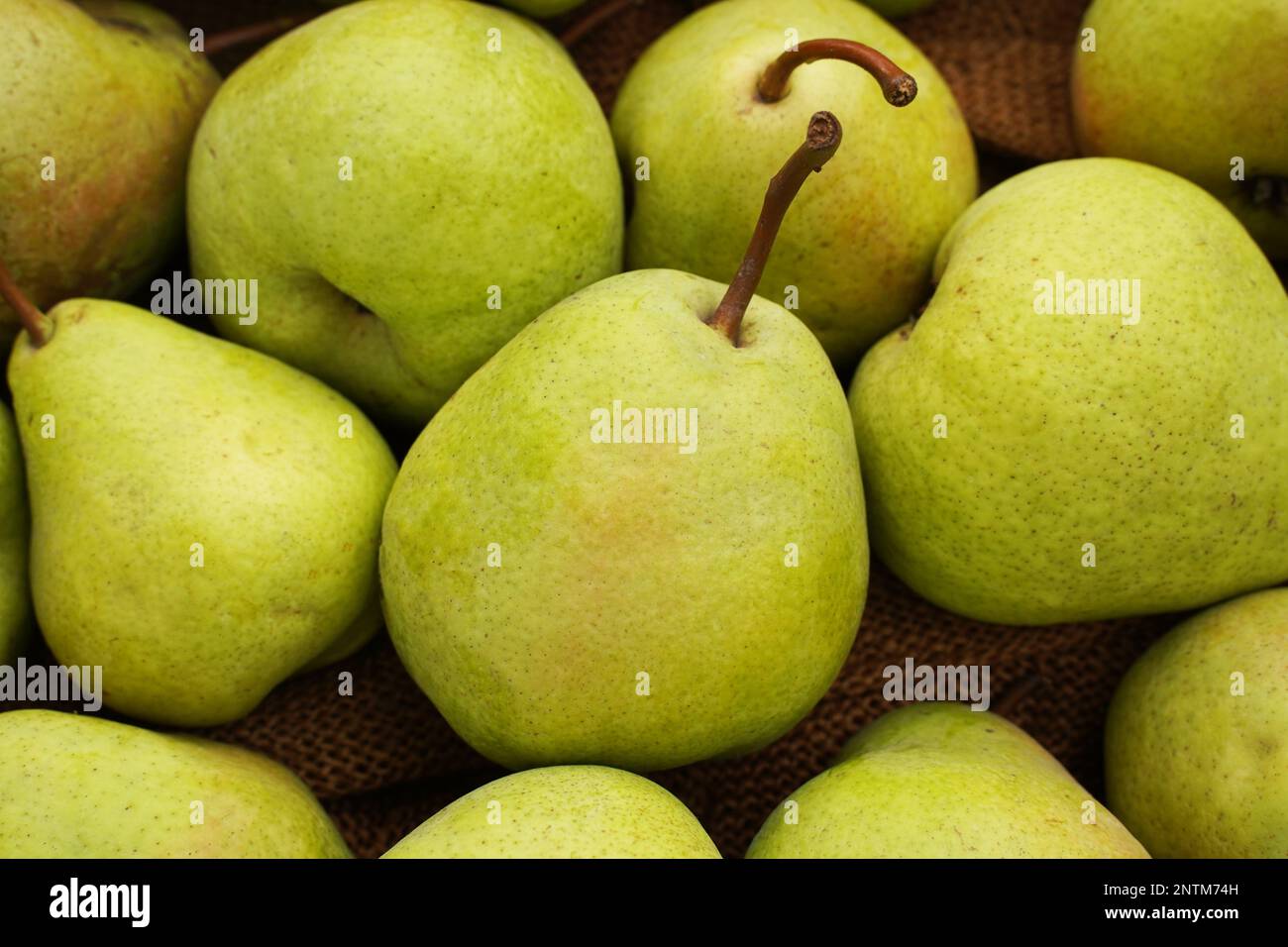 Green pear close-up, fresh fruit natural background Stock Photo - Alamy