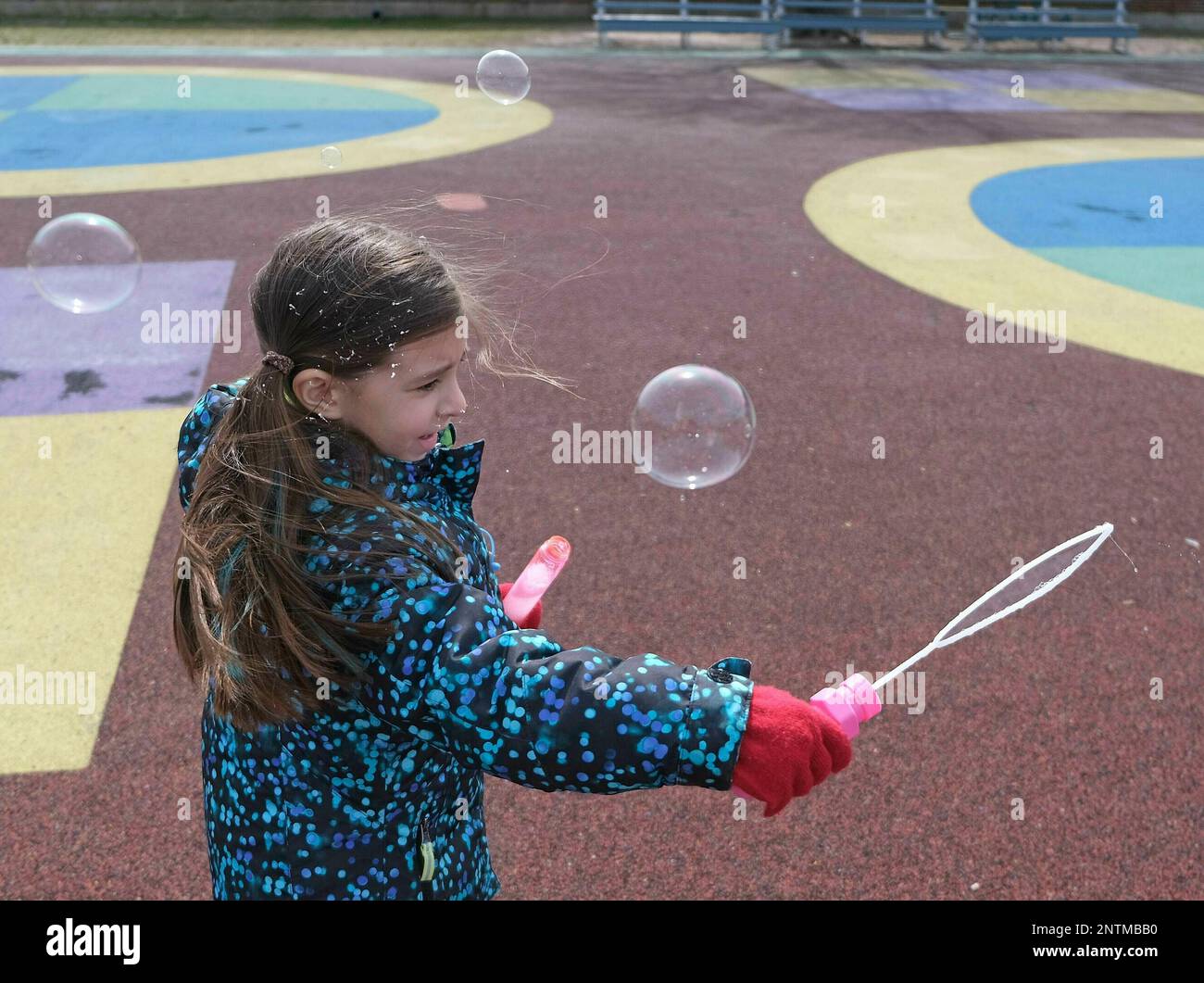 Francesca Pittaluga,7, spinning with bubble wand at the event. Ocean ...