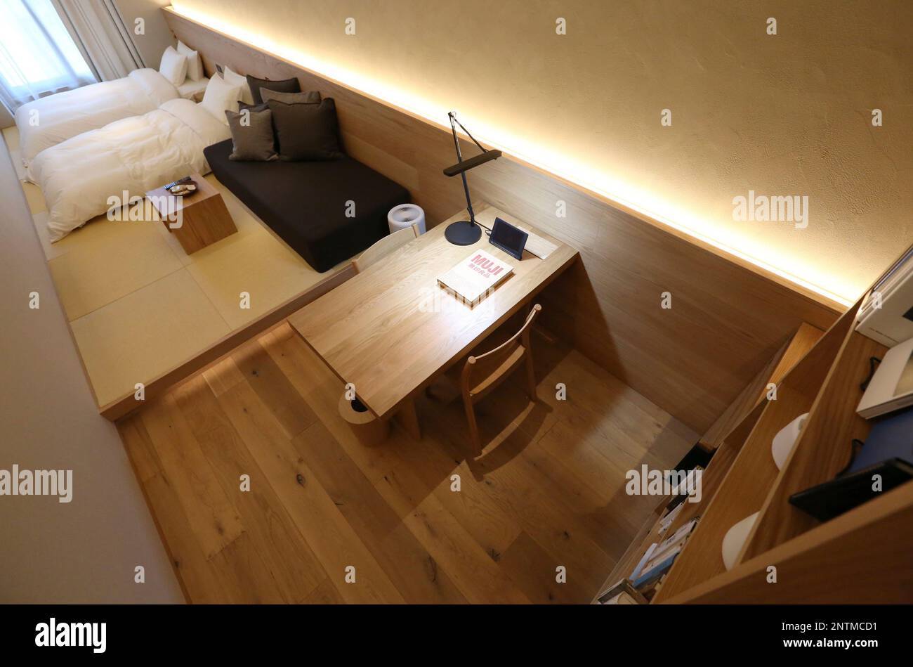 A photo shows a guest room of MUJI HOTEL GINZA unveiled to media in ...