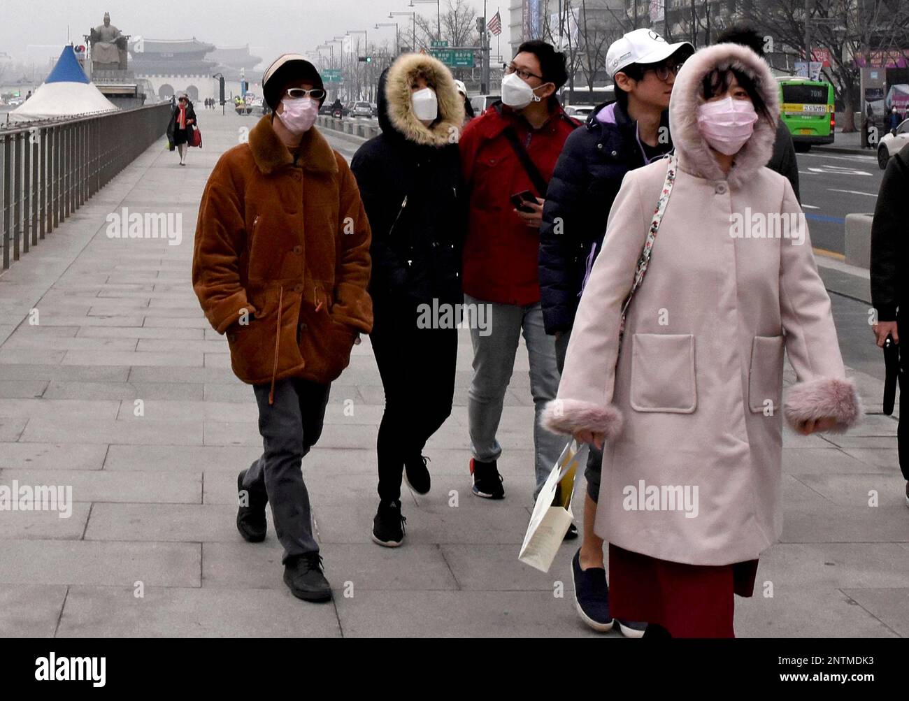 People wear masks as the PM 2.5 is measured the highest on record in ...