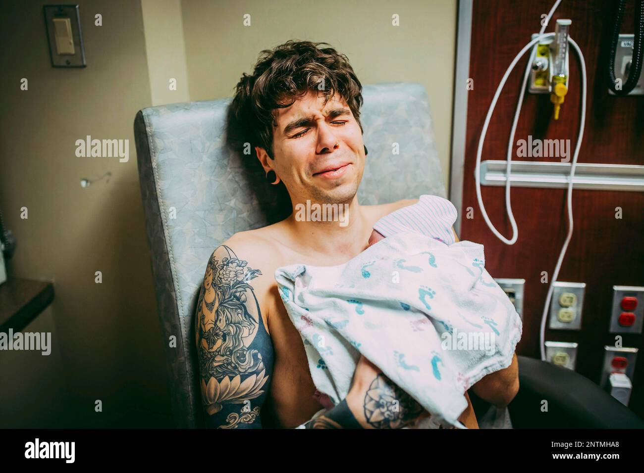 In this March 25, 2019 photo, Elliot Dougherty holds his daughter Uma ...