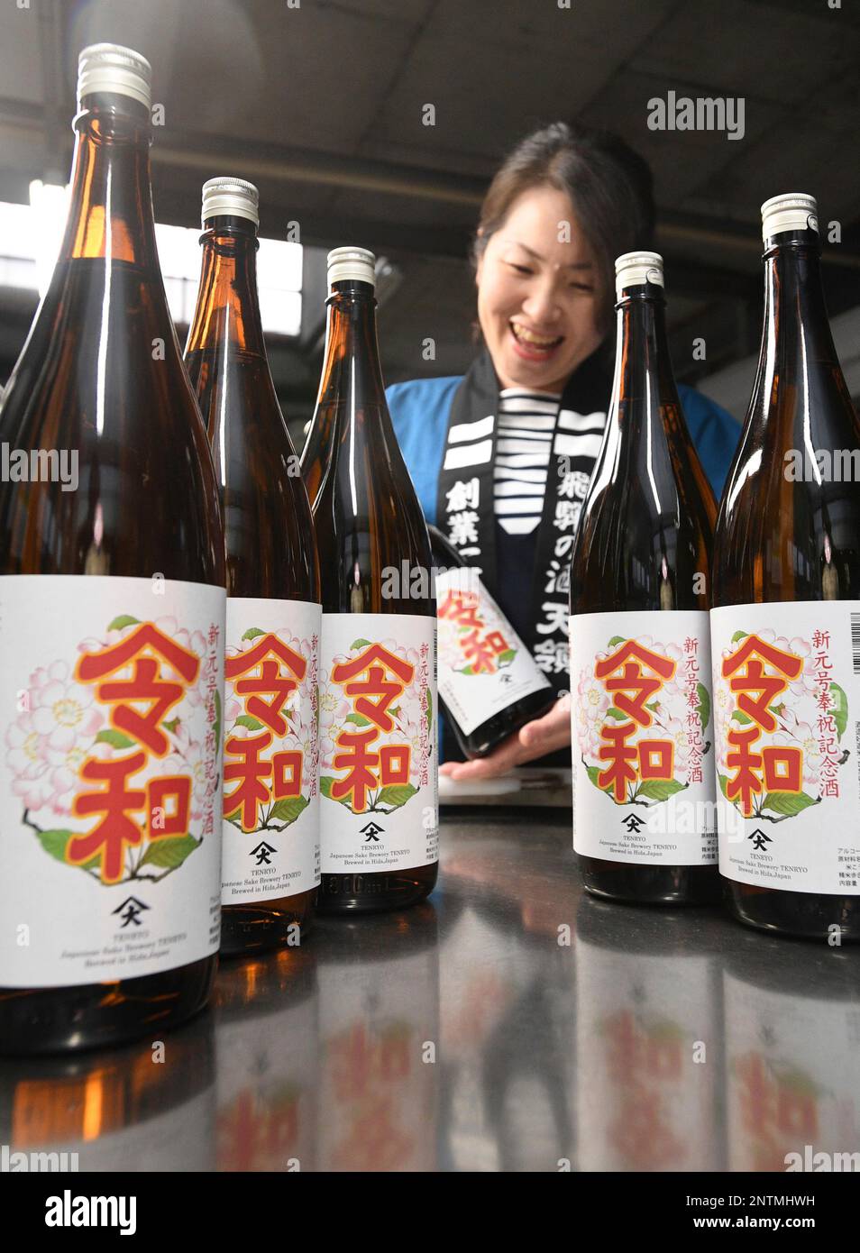 Bottles of sake labelled on Reiwa, a new era name are shown at Tenryu ...