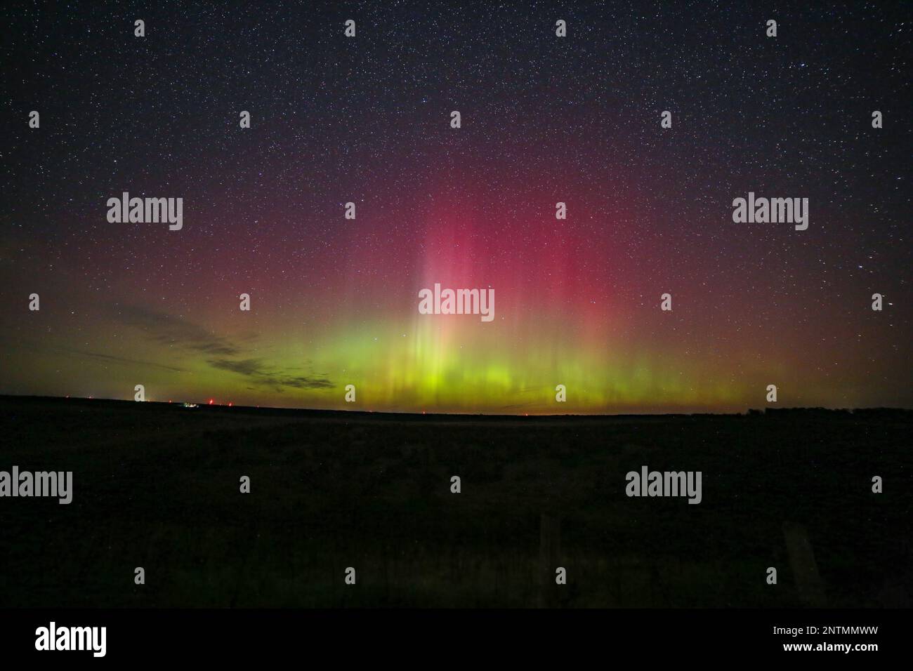 A spectacular night sky with a vivid aurora display and a starry sky - great for wallpapers ...