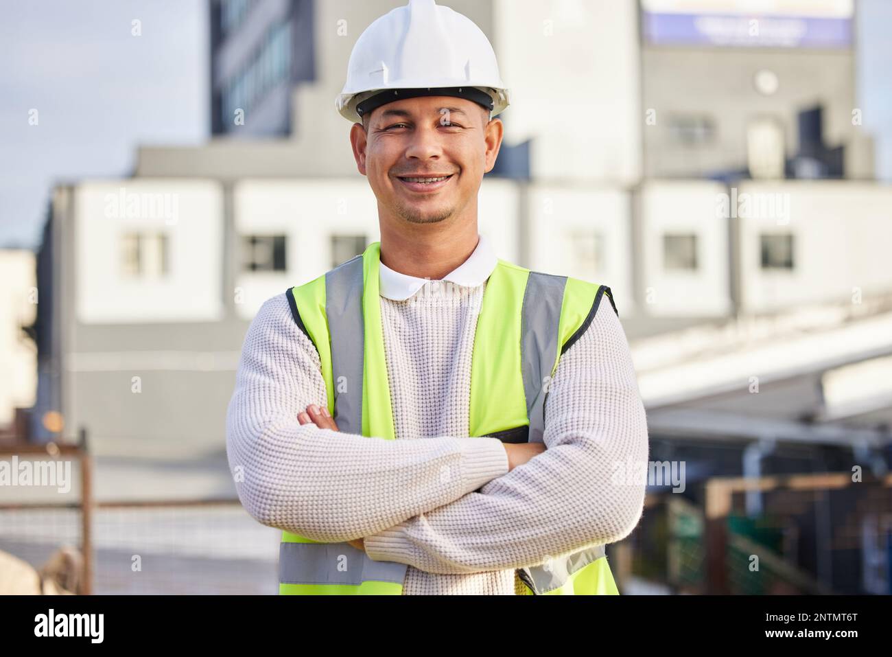 Architect man, outdoor portrait and arms crossed with leadership, smile ...