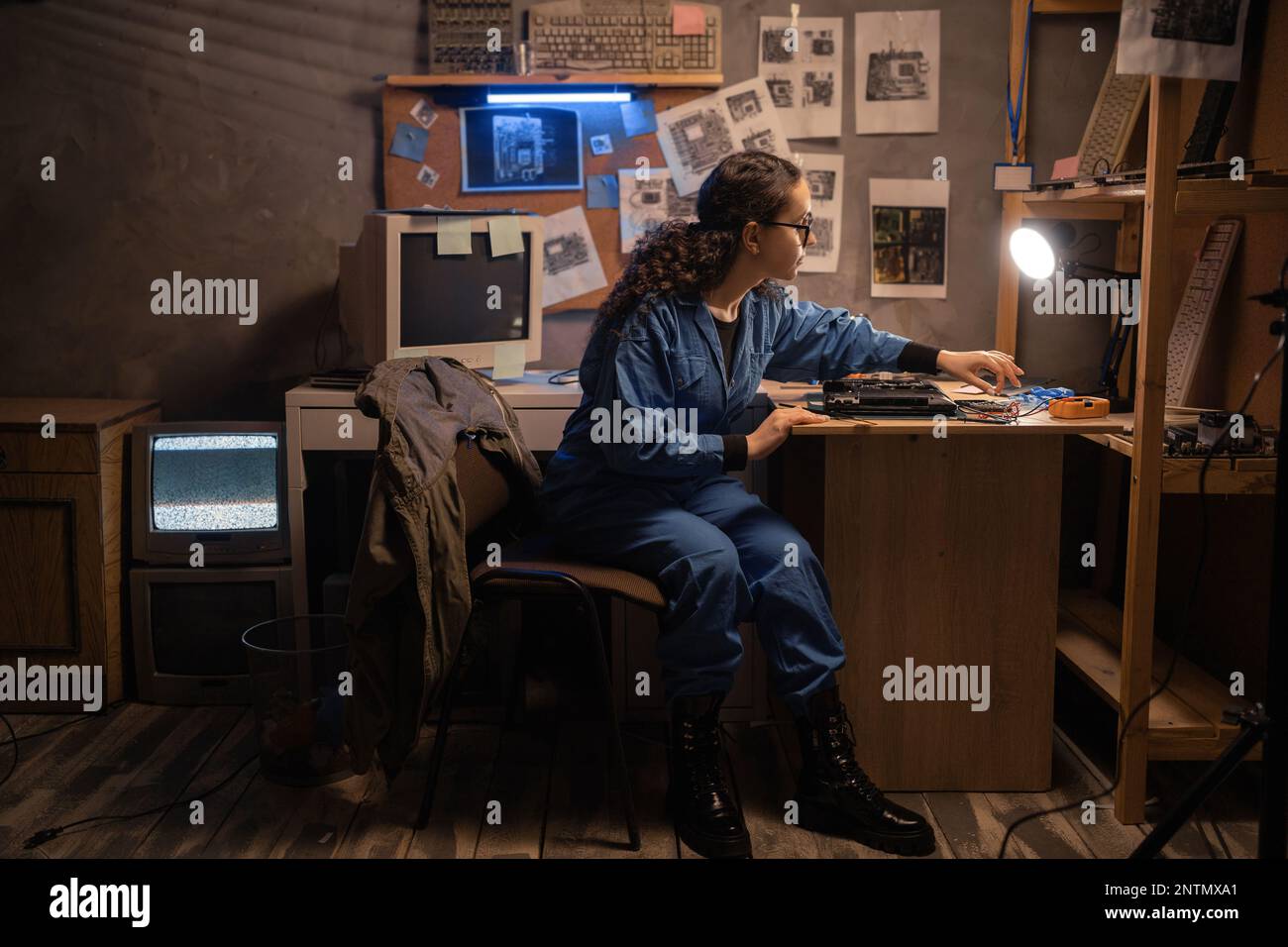 Beautiful engineer repairing laptop computer. Young women repairing ...