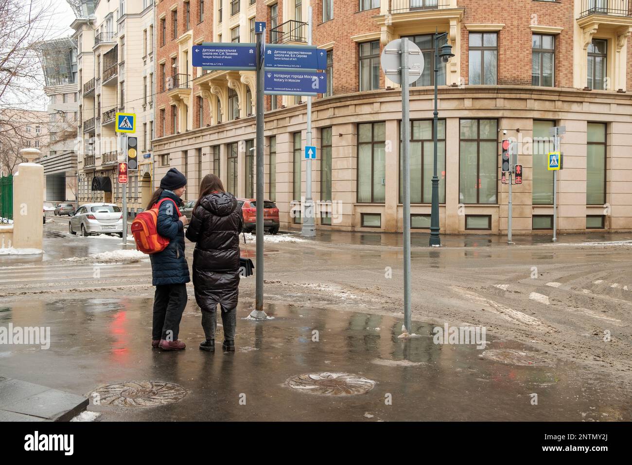 Moscow. Russia. February 25, 2023. Two women from the back at the ...