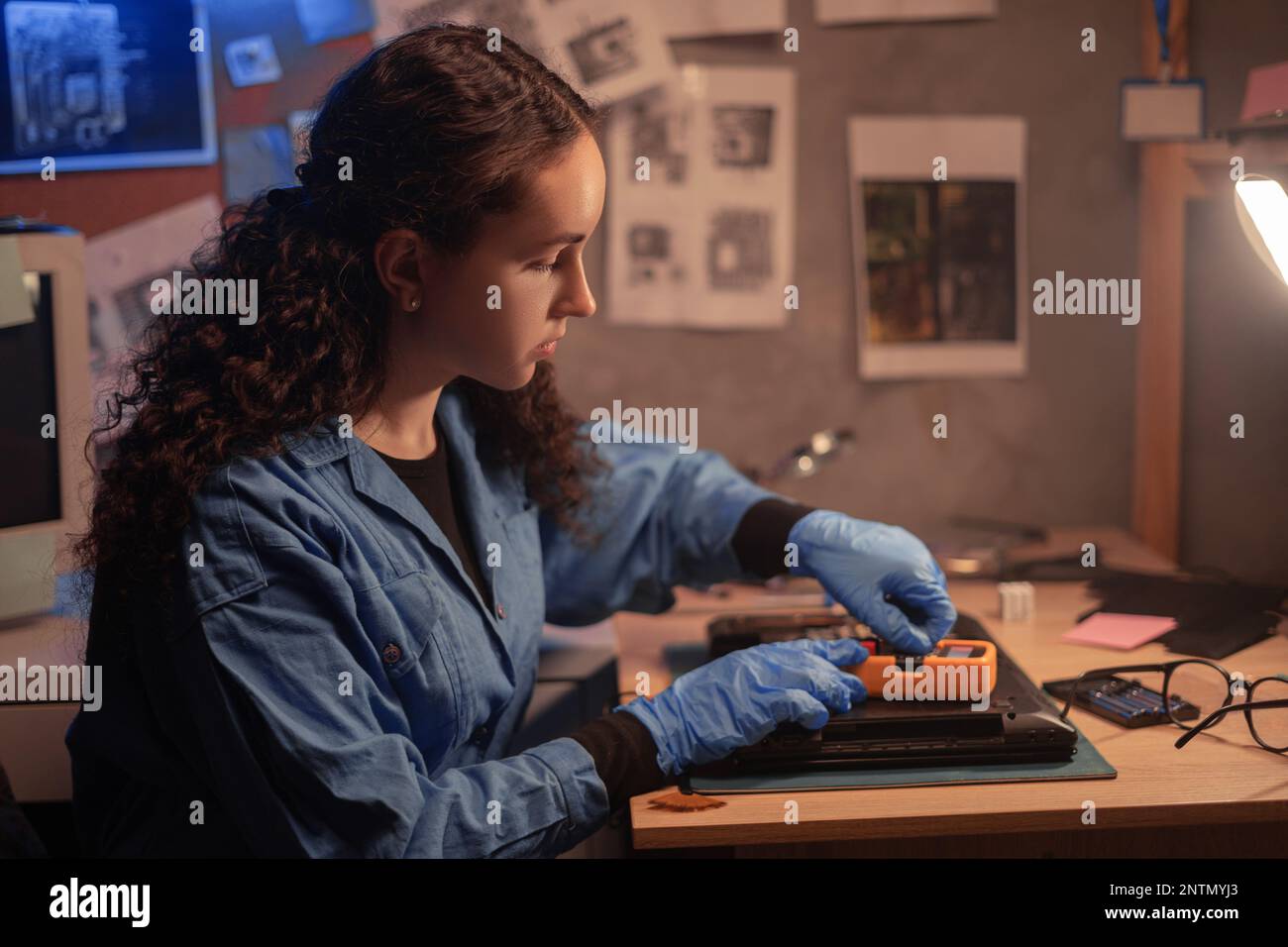 technical check problem for laptop computer with multimeter. Female ...