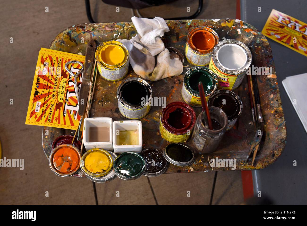 In this Thursday, March 14, 2019 photo, small paint cans are part of ...