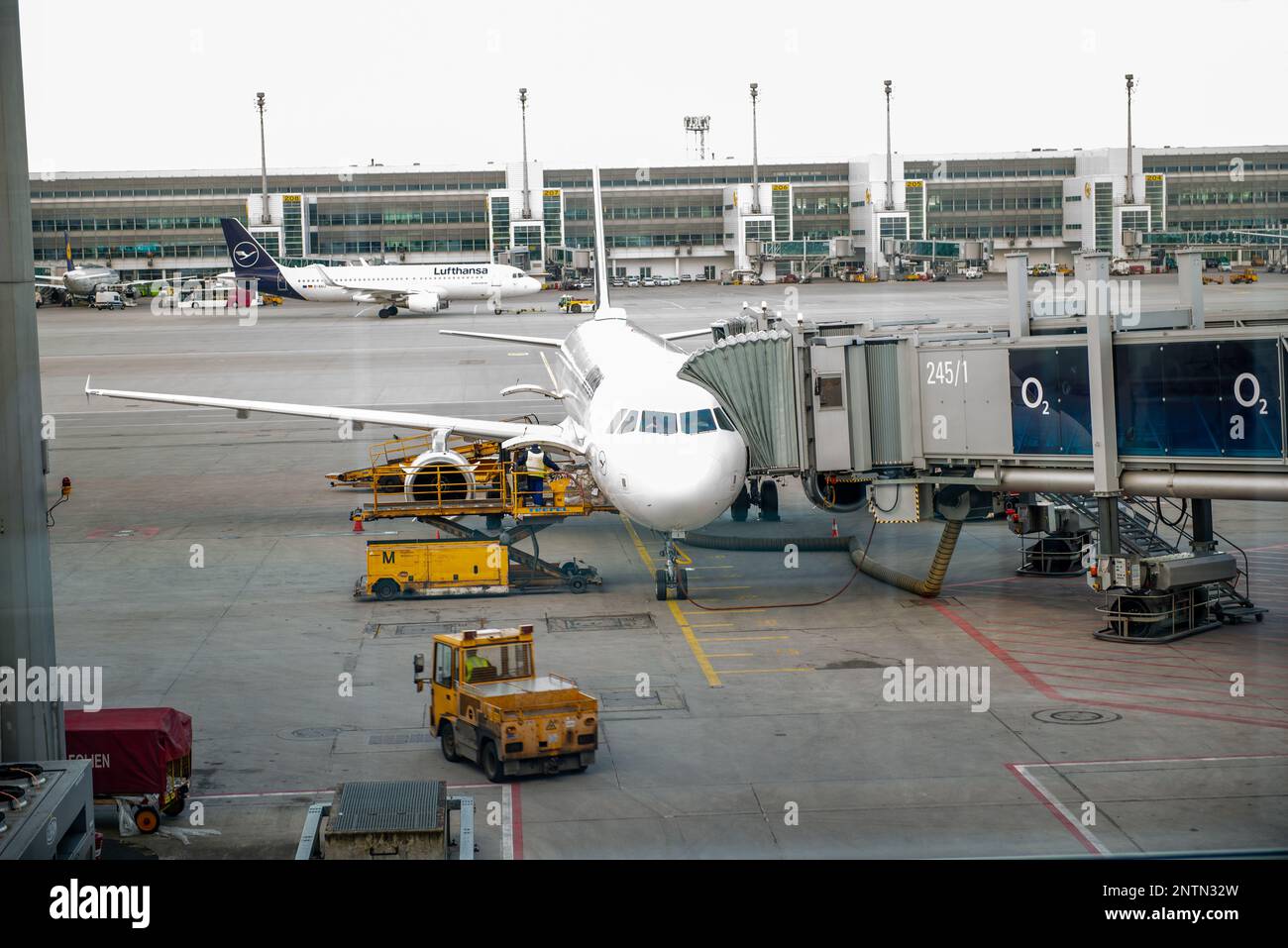 :Airplane being loaded at gate before departure Stock Photo - Alamy