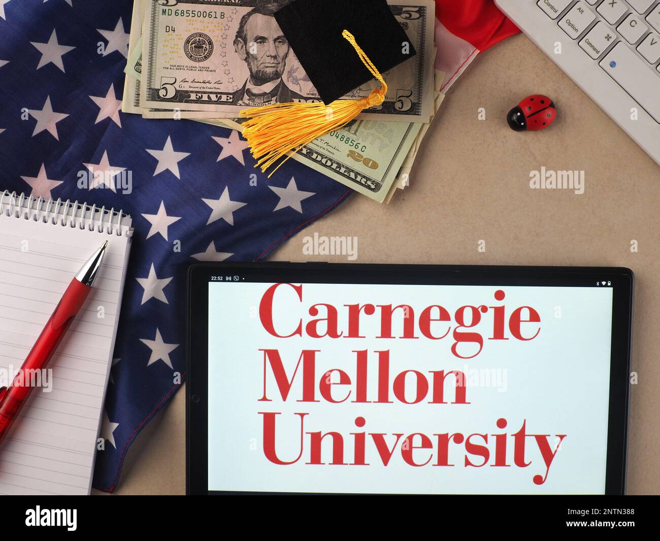 IIn this photo illustration, Carnegie Mellon University logo seen ...