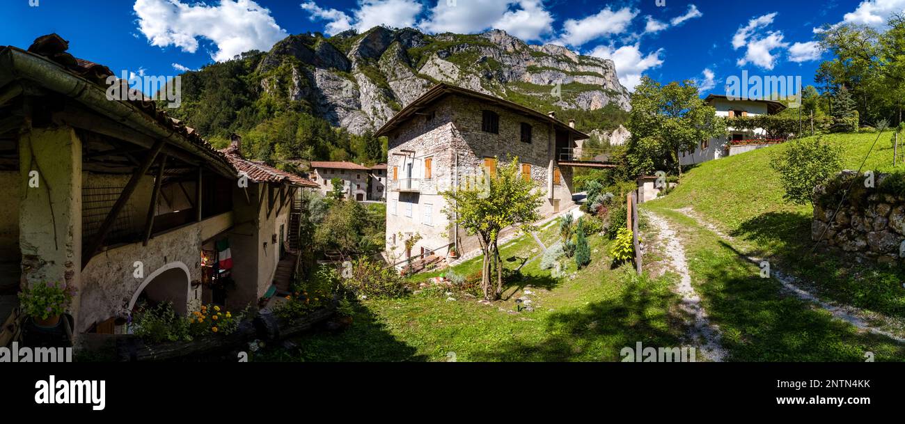 Panoramic view of farmers houses, green pastures and trees of the ...