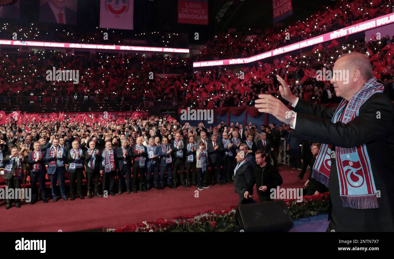 Turkey's President Recep Tayyip Erdogan salutes his supporters from the ...