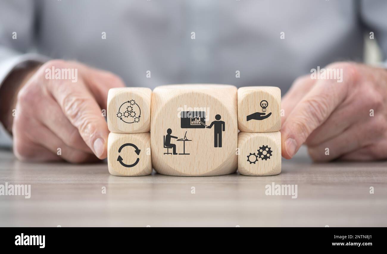 Wooden blocks with symbol of coaching concept Stock Photo - Alamy