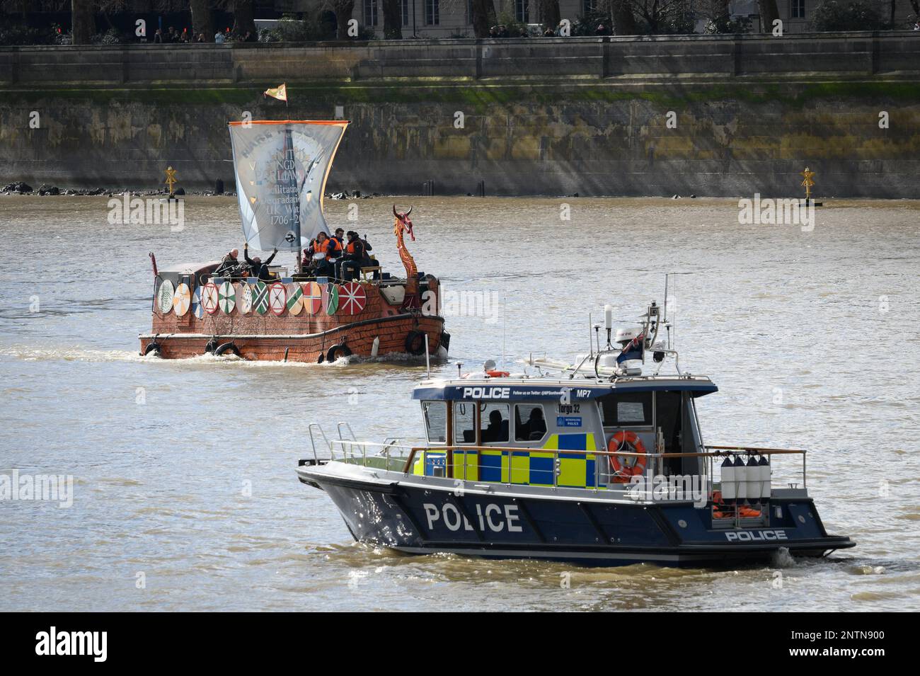London, UK. 27 February, 2023. A police launch on the River Thames ...