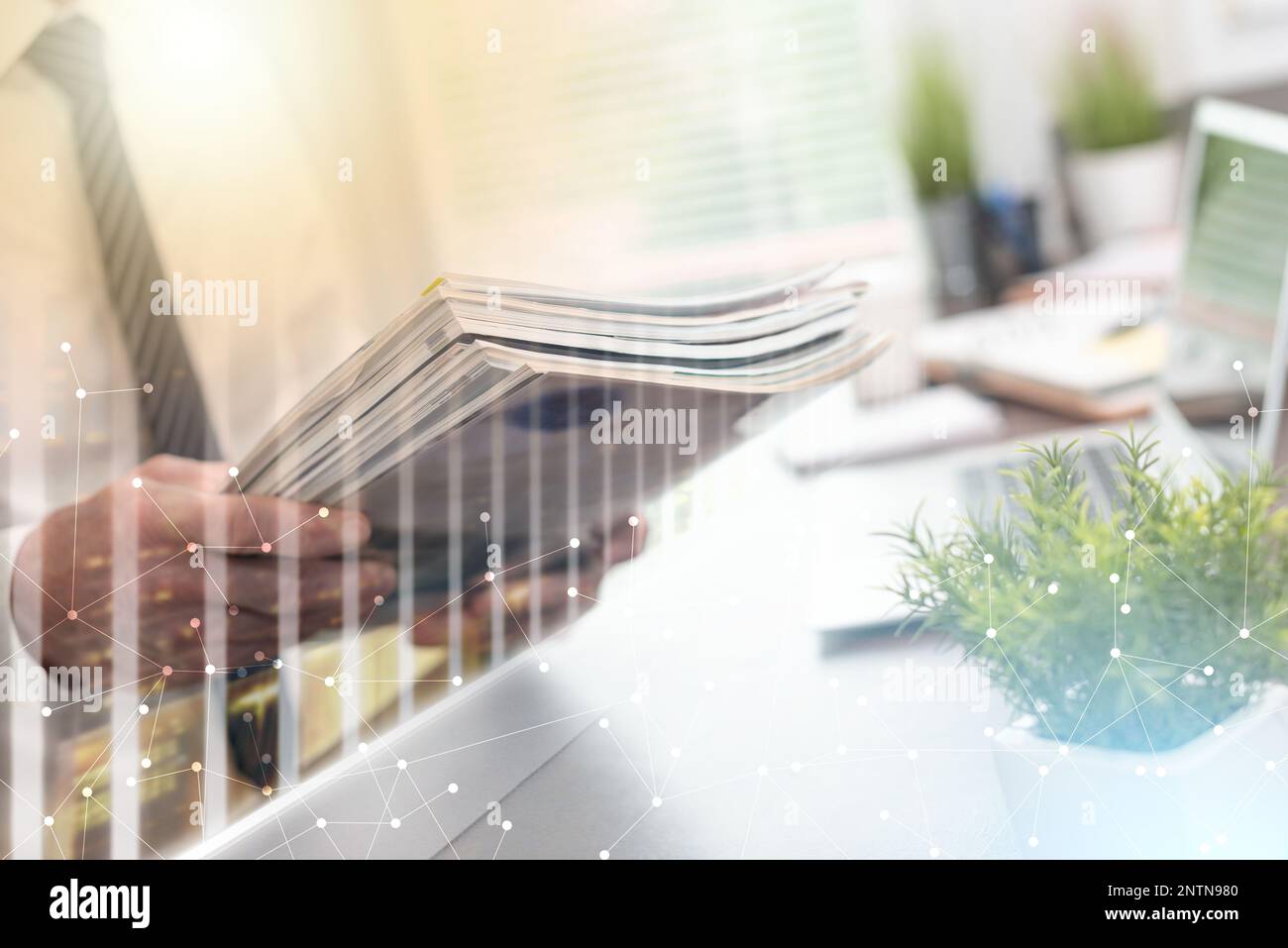 Hands of businessman holding magazines; multiple exposure Stock Photo ...